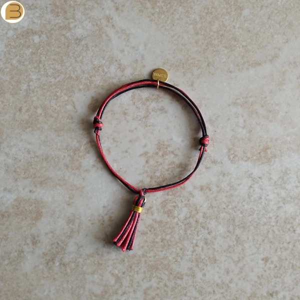 Bracelet réglable double cordon et pompon en coton rouge et noir ...